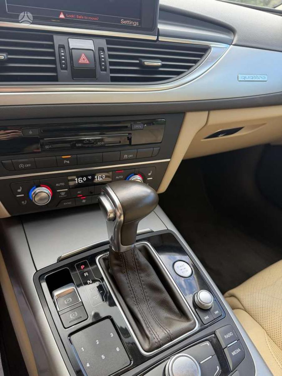 Brown Audi A6 2012 in Prienai, with an engine capacity of 2.97 L and mileage of 295 thousand km for 8850 €, photo 15 on AUTOMOTO.COM.LV