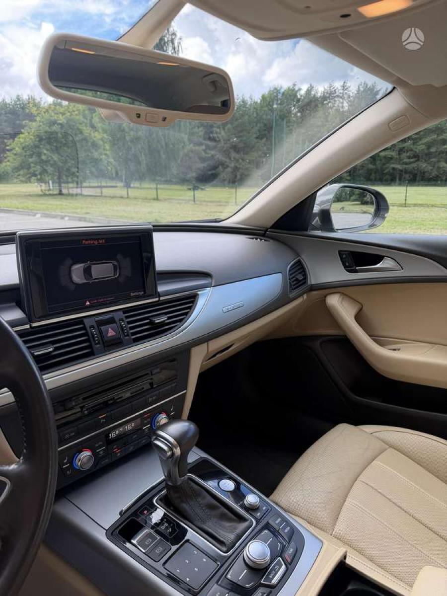 Brown Audi A6 2012 in Prienai, with an engine capacity of 2.97 L and mileage of 295 thousand km for 8850 €, photo 17 on AUTOMOTO.COM.LV
