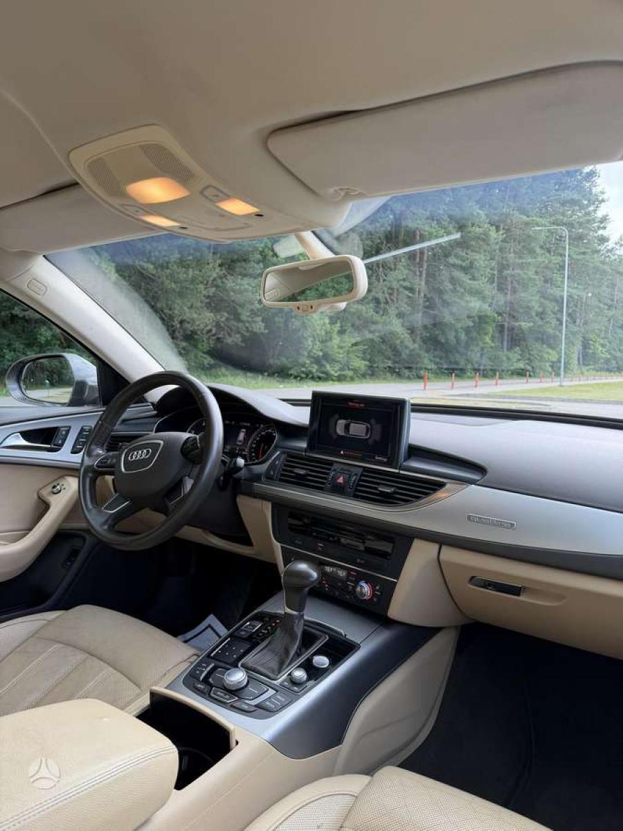 Brown Audi A6 2012 in Prienai, with an engine capacity of 2.97 L and mileage of 295 thousand km for 8850 €, photo 22 on AUTOMOTO.COM.LV