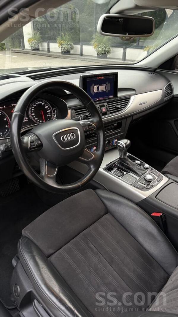 Brown Audi A6 2014 in Riga, with an engine capacity of 3.00 L and mileage of 344 thousand km for 8338 €, photo 7 on AUTOMOTO.COM.LV