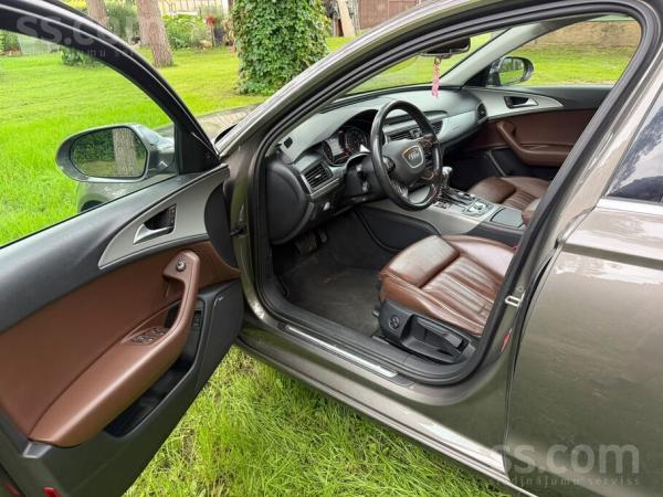 Brown Audi A6 2014 in Riga, with an engine capacity of 3.00 L and mileage of 239 thousand km for 9800 €, photo 10 on AUTOMOTO.COM.LV