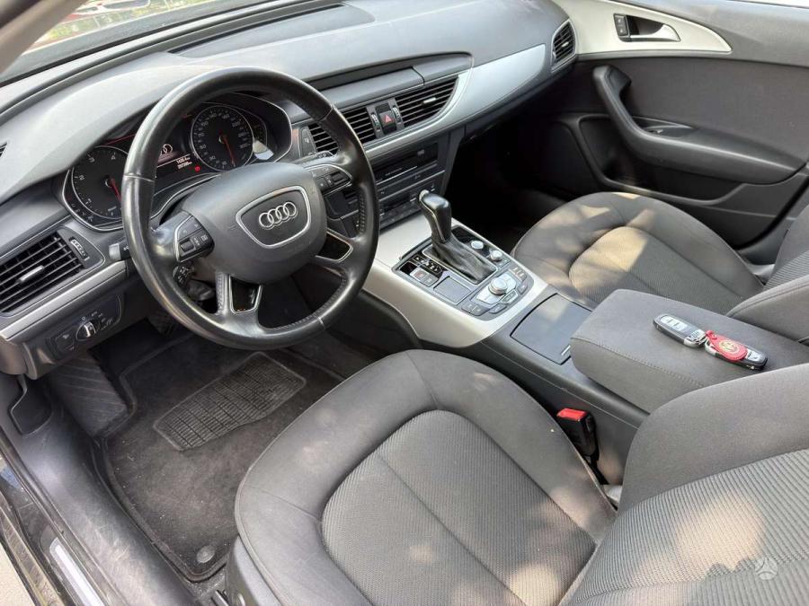 Brown Audi A6 2015 in Panevezys, with an engine capacity of 1.97 L and mileage of 297 thousand km for 10999 €, photo 15 on AUTOMOTO.COM.LV