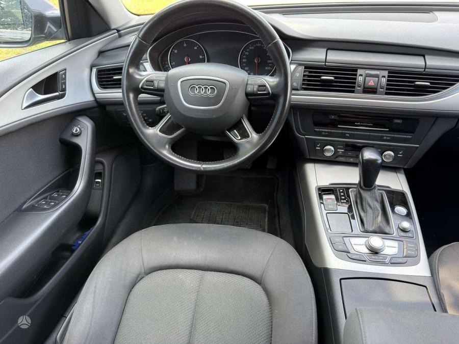 Brown Audi A6 2015 in Panevezys, with an engine capacity of 1.97 L and mileage of 297 thousand km for 10999 €, photo 16 on AUTOMOTO.COM.LV