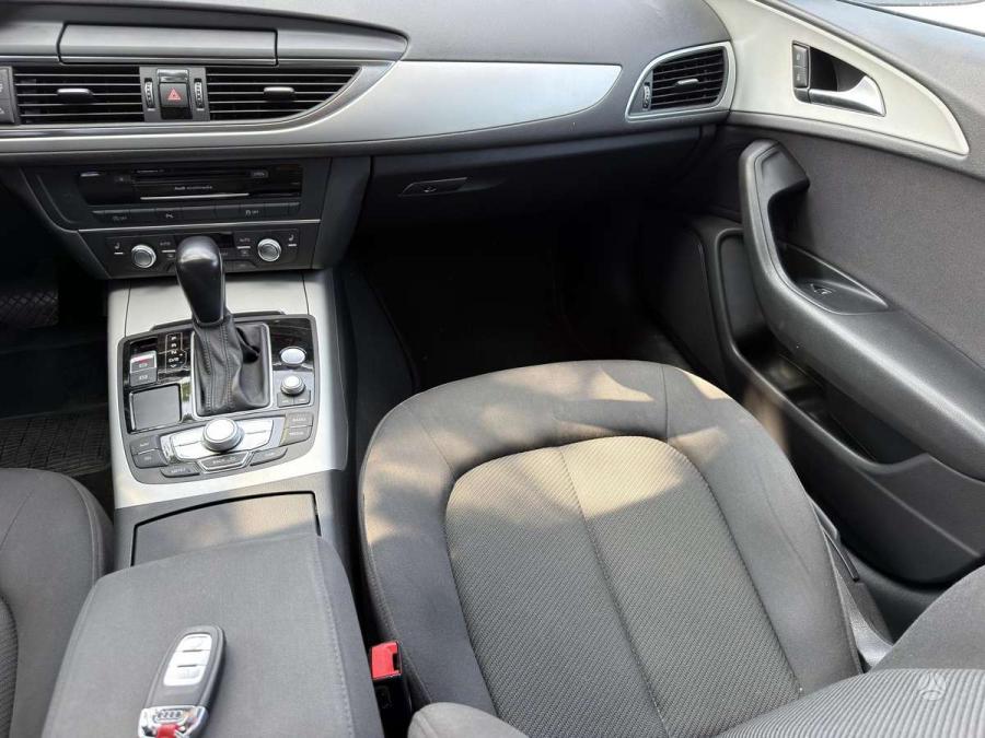 Brown Audi A6 2015 in Panevezys, with an engine capacity of 1.97 L and mileage of 297 thousand km for 10999 €, photo 17 on AUTOMOTO.COM.LV