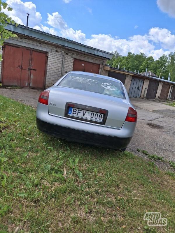Grey Audi A6 1997 in Siauliai, with an engine capacity of 1.80 L and mileage of 409 thousand km for 600 €, photo 5 on AUTOMOTO.COM.LV
