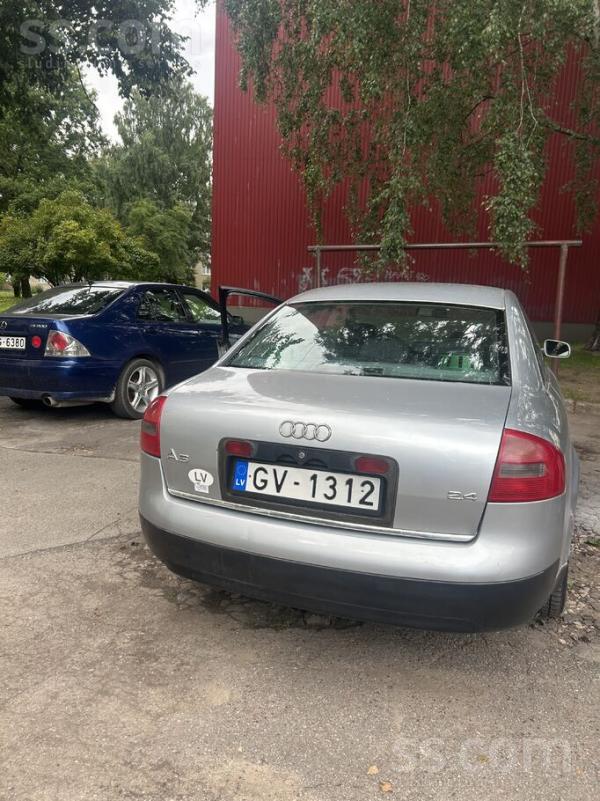 Pelēks Audi A6 1997 Ogre, ar dzinēja tilpumu 2.40 L un nobraukumu 378 tūkst. km par 1350 €, foto 2 vietnē AUTOMOTO.COM.LV