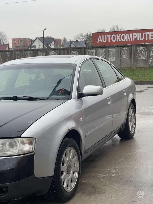 Grey Audi A6 1998 in Mazeikiai, with an engine capacity of 2.40 L and mileage of 233 thousand km for 900 €, photo 3 on AUTOMOTO.COM.LV