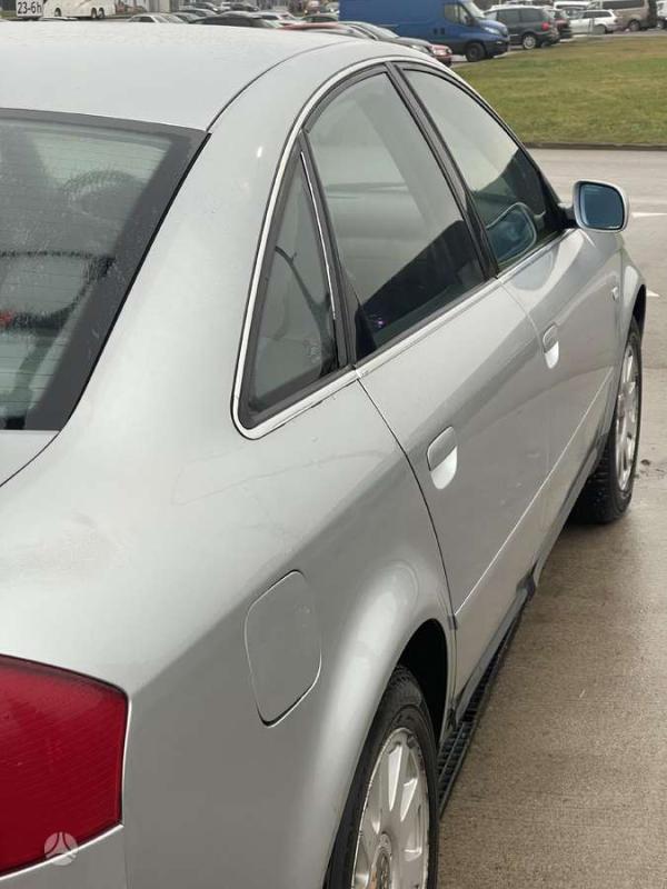 Grey Audi A6 1998 in Mazeikiai, with an engine capacity of 2.40 L and mileage of 233 thousand km for 900 €, photo 5 on AUTOMOTO.COM.LV