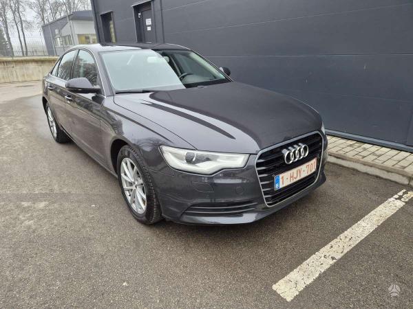 Grey Audi A6 2011 in Raseiniai, with an engine capacity of 1.97 L and mileage of 312 thousand km for 7300 €, photo 2 on AUTOMOTO.COM.LV