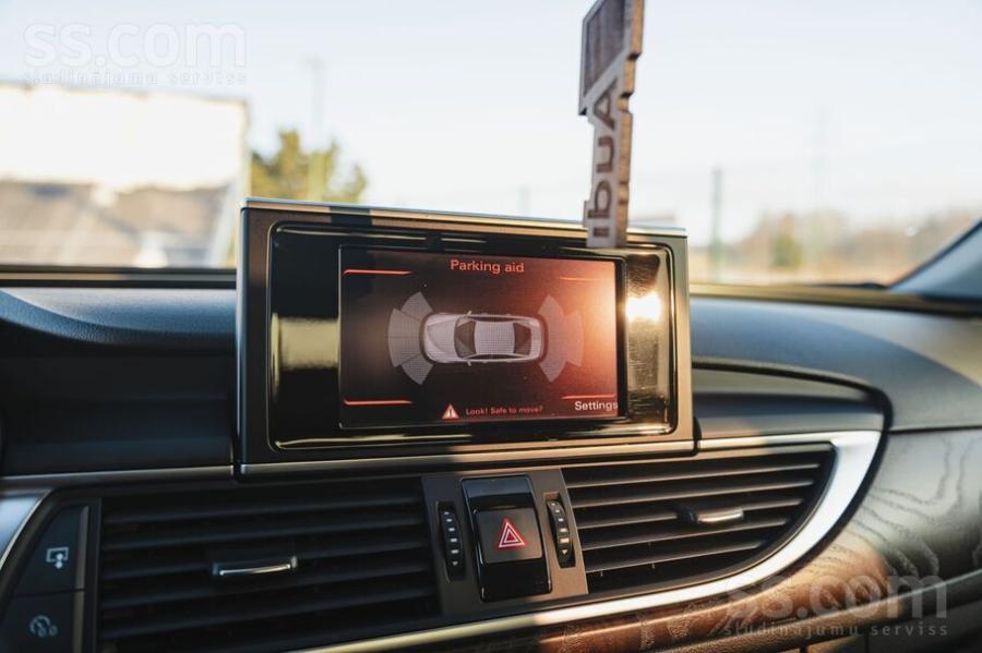 Grey Audi A6 2011 in Riga, with an engine capacity of 2.80 L and mileage of 239 thousand km for 9490 €, photo 20 on AUTOMOTO.COM.LV
