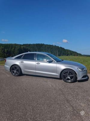 Grey Audi A6 2011 in Ignalina, with an engine capacity of 1.97 L and mileage of 269 thousand km for 7900 €, photo 14 on AUTOMOTO.COM.LV