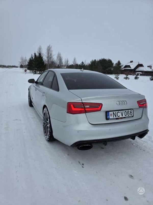 Grey Audi A6 2012 in Klaipeda, with an engine capacity of 3.00 L and mileage of 246 thousand km for 12400 €, photo 4 on AUTOMOTO.COM.LV