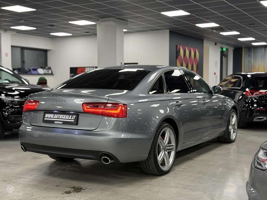 Grey Audi A6 2013 in Klaipeda, with an engine capacity of 2.97 L and mileage of 306 thousand km for 9900 €, photo 3 on AUTOMOTO.COM.LV