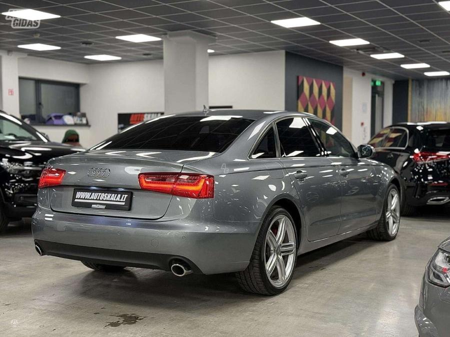 Grey Audi A6 2013 in Klaipeda, with an engine capacity of 3.00 L and mileage of 306 thousand km for 9900 €, photo 3 on AUTOMOTO.COM.LV