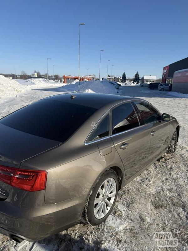 Grey Audi A6 2013 in Kretinga, with an engine capacity of 3.00 L and mileage of 264 thousand km for 11000 €, photo 4 on AUTOMOTO.COM.LV