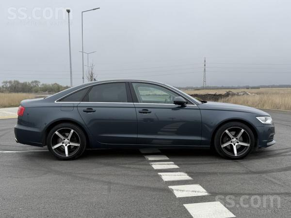 Grey Audi A6 2013 in Liepaja, with an engine capacity of 2.00 L and mileage of 248 thousand km for 8100 €, photo 5 on AUTOMOTO.COM.LV