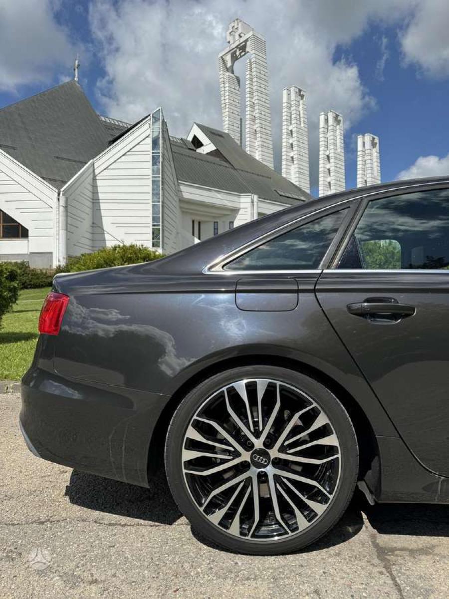 Grey Audi A6 2013 in Elektrenai, with an engine capacity of 2.97 L and mileage of 238 thousand km for 14900 €, photo 7 on AUTOMOTO.COM.LV