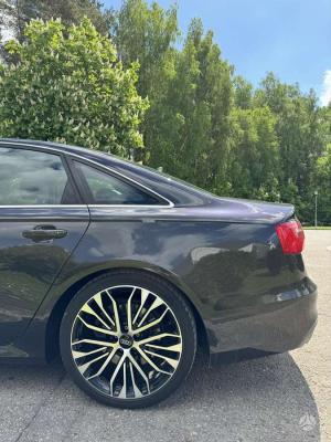 Grey Audi A6 2013 in Elektrenai, with an engine capacity of 2.97 L and mileage of 238 thousand km for 14900 €, photo 9 on AUTOMOTO.COM.LV