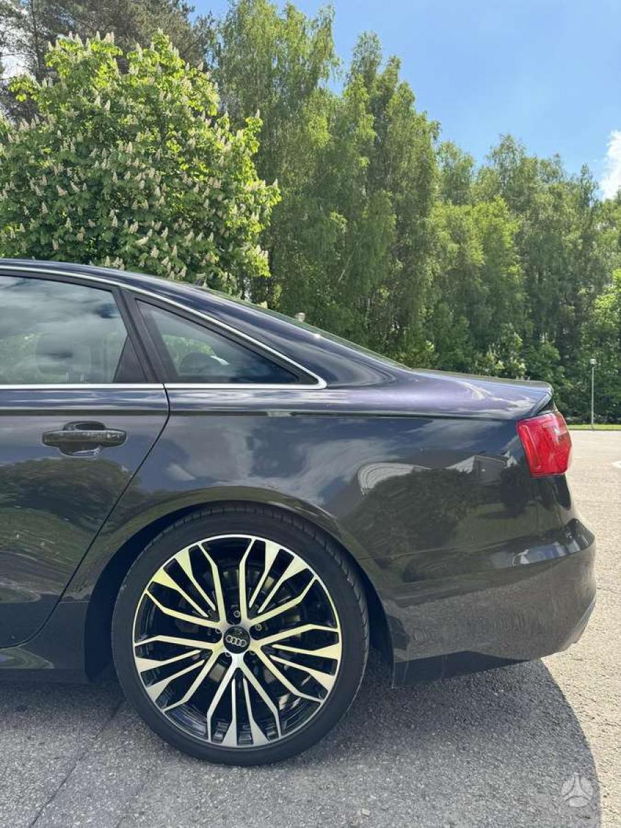 Grey Audi A6 2013 in Elektrenai, with an engine capacity of 2.97 L and mileage of 238 thousand km for 14900 €, photo 9 on AUTOMOTO.COM.LV
