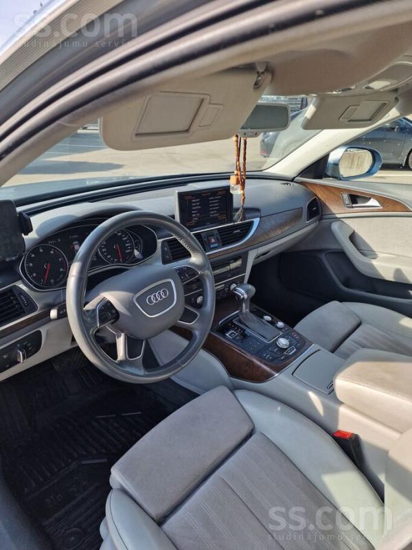 Grey Audi A6 2013 in Riga, with an engine capacity of 2.00 L and mileage of 205 thousand km for 9500 €, photo 9 on AUTOMOTO.COM.LV
