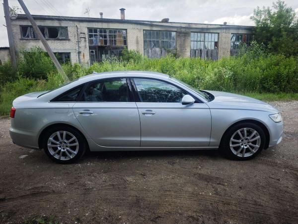 Grey Audi A6 2014 in Ignalina, with an engine capacity of 2.97 L and mileage of 253 thousand km for 8850 €, photo 4 on AUTOMOTO.COM.LV