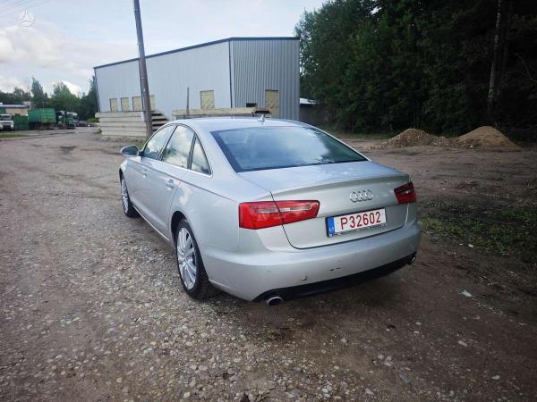 Grey Audi A6 2014 in Ignalina, with an engine capacity of 2.97 L and mileage of 253 thousand km for 8850 €, photo 6 on AUTOMOTO.COM.LV