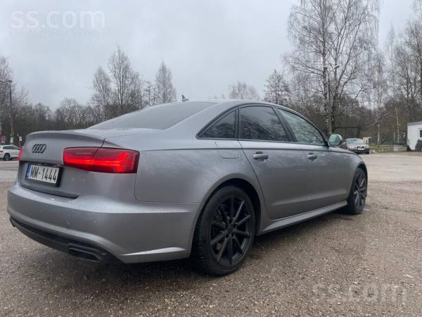 Grey Audi A6 2014 in Riga, with an engine capacity of 2.00 L and mileage of 255 thousand km for 13500 €, photo 4 on AUTOMOTO.COM.LV