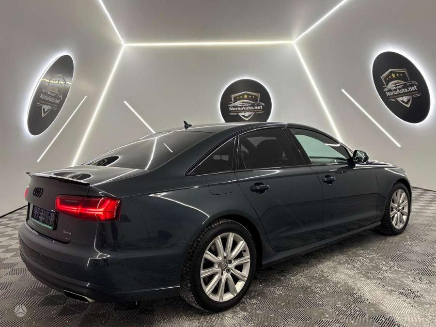 Grey Audi A6 2015 in Marijampole, with an engine capacity of 2.97 L and mileage of 225 thousand km for 14999 €, photo 26 on AUTOMOTO.COM.LV