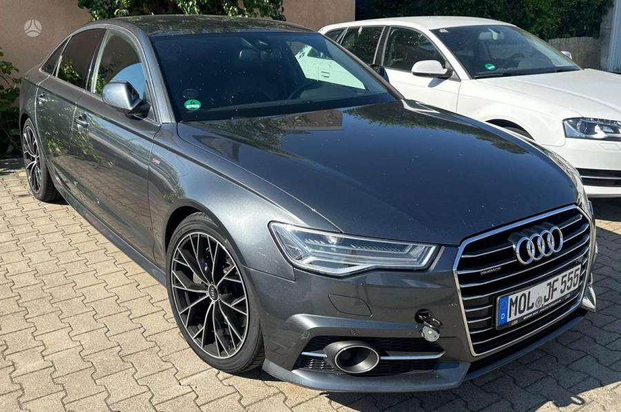 Grey Audi A6 2015 in Marijampole, with an engine capacity of 2.97 L and mileage of 230 thousand km for 10000 €, photo 1 on AUTOMOTO.COM.LV