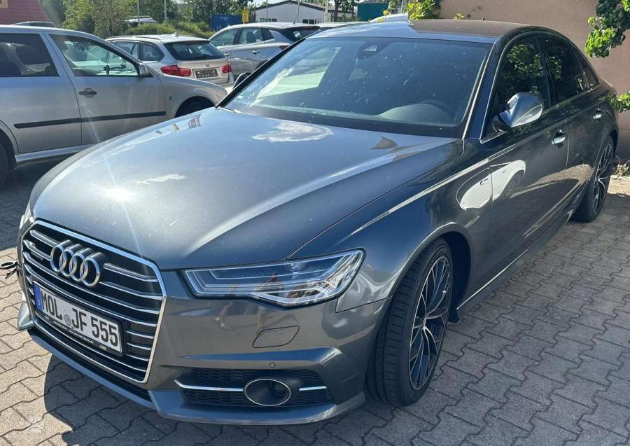 Grey Audi A6 2015 in Marijampole, with an engine capacity of 2.97 L and mileage of 230 thousand km for 9900 €, photo 1 on AUTOMOTO.COM.LV