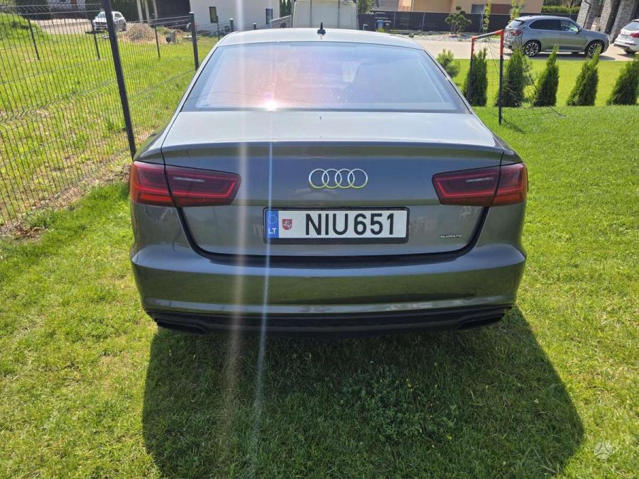 Grey Audi A6 2015 in Vilnius, with an engine capacity of 2.97 L and mileage of 330 thousand km for 9900 €, photo 4 on AUTOMOTO.COM.LV