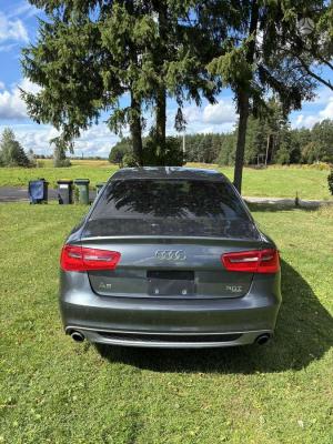 Grey Audi A6 2015 in Vilnius, with an engine capacity of 3.00 L and mileage of 230 thousand km for 6200 €, photo 1 on AUTOMOTO.COM.LV