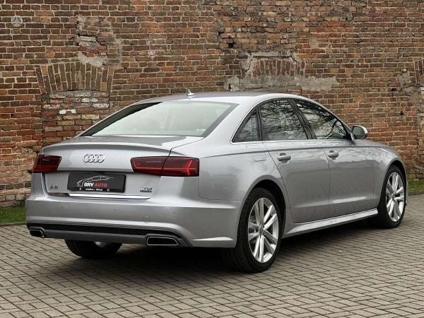 Grey Audi A6 2016 in Kedainiai, with an engine capacity of 2.97 L and mileage of 246 thousand km for 17650 €, photo 7 on AUTOMOTO.COM.LV