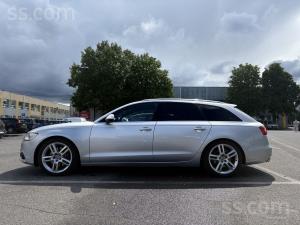 Grey Audi A6 2012 in Riga, with an engine capacity of 3.00 L and mileage of 251 thousand km for 11990 €, photo 7 on AUTOMOTO.COM.LV