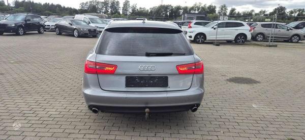 Grey Audi A6 2013 in Marijampole, with an engine capacity of 2.97 L and mileage of 300 thousand km for 10950 €, photo 5 on AUTOMOTO.COM.LV