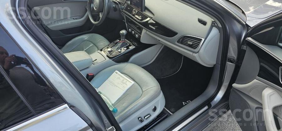 Grey Audi A6 2014 in Riga, with an engine capacity of 3.00 L and mileage of 300 thousand km for 10000 €, photo 12 on AUTOMOTO.COM.LV