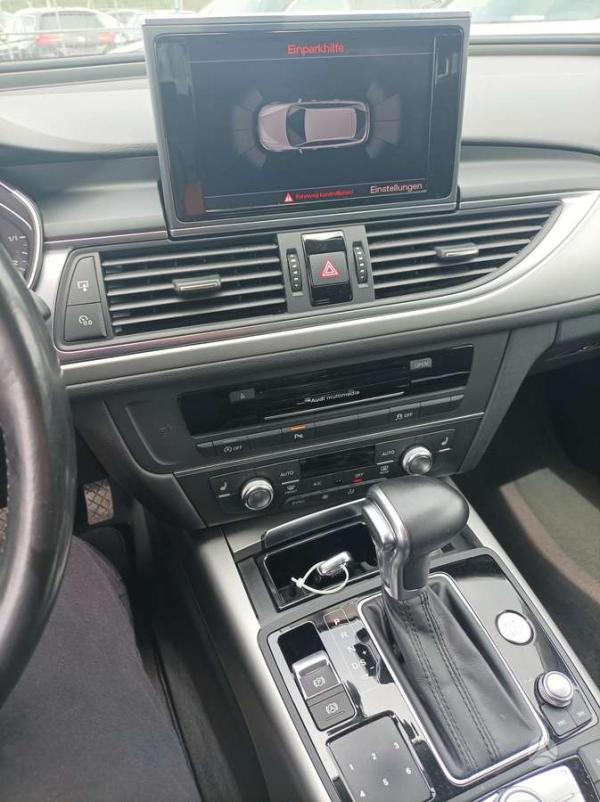 Grey Audi A6 2014 in Kaunas, with an engine capacity of 2.00 L and mileage of 270 thousand km for 8550 €, photo 10 on AUTOMOTO.COM.LV