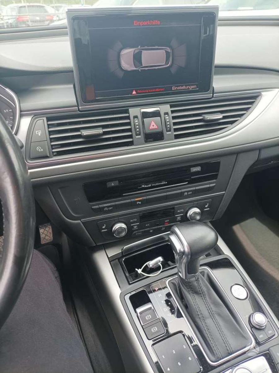 Grey Audi A6 2014 in Kaunas, with an engine capacity of 2.00 L and mileage of 270 thousand km for 8550 €, photo 11 on AUTOMOTO.COM.LV