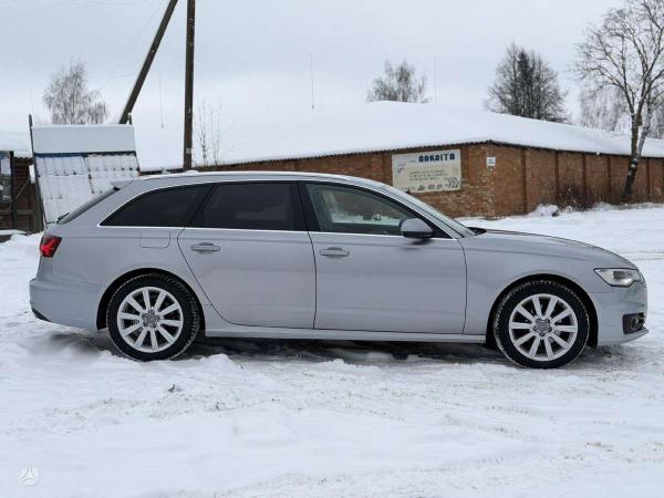 Grey Audi A6 2015 in Utena, with an engine capacity of 1.97 L and mileage of 244 thousand km for 13650 €, photo 5 on AUTOMOTO.COM.LV