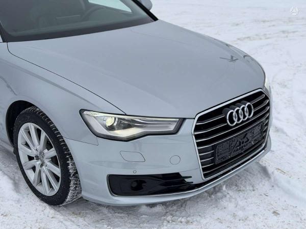 Grey Audi A6 2015 in Utena, with an engine capacity of 1.97 L and mileage of 244 thousand km for 13650 €, photo 9 on AUTOMOTO.COM.LV