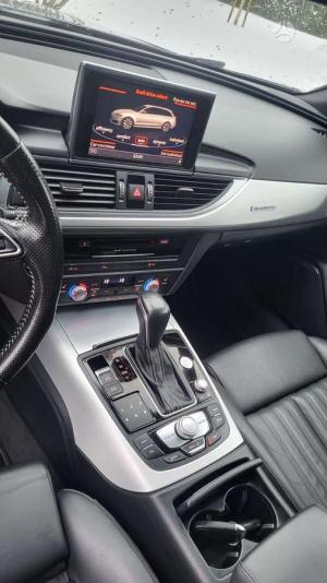 Grey Audi A6 2015 in Jonava, with an engine capacity of 2.97 L and mileage of 256 thousand km for 13800 €, photo 12 on AUTOMOTO.COM.LV