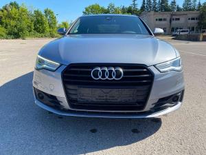 Grey Audi A6 2015 in Raseiniai, with an engine capacity of 1.97 L and mileage of 228 thousand km for 11300 €, photo 4 on AUTOMOTO.COM.LV