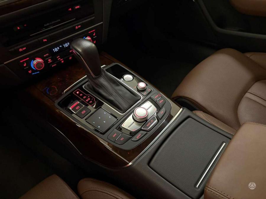 Grey Audi A6 2015 in Marijampole, with an engine capacity of 2.97 L and mileage of 265 thousand km for 13999 €, photo 31 on AUTOMOTO.COM.LV