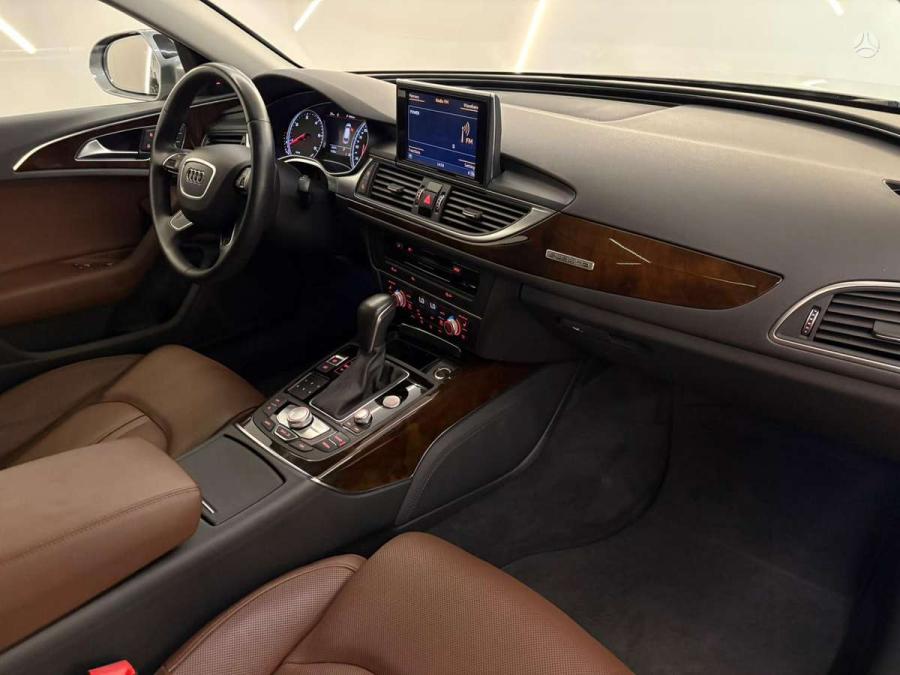 Grey Audi A6 2015 in Marijampole, with an engine capacity of 2.97 L and mileage of 265 thousand km for 13999 €, photo 35 on AUTOMOTO.COM.LV