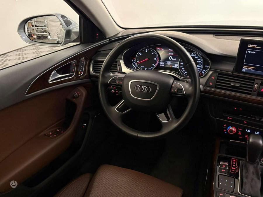 Grey Audi A6 2015 in Marijampole, with an engine capacity of 2.97 L and mileage of 265 thousand km for 13999 €, photo 38 on AUTOMOTO.COM.LV