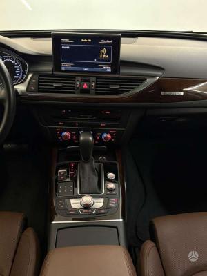 Grey Audi A6 2015 in Marijampole, with an engine capacity of 2.97 L and mileage of 265 thousand km for 13999 €, photo 39 on AUTOMOTO.COM.LV