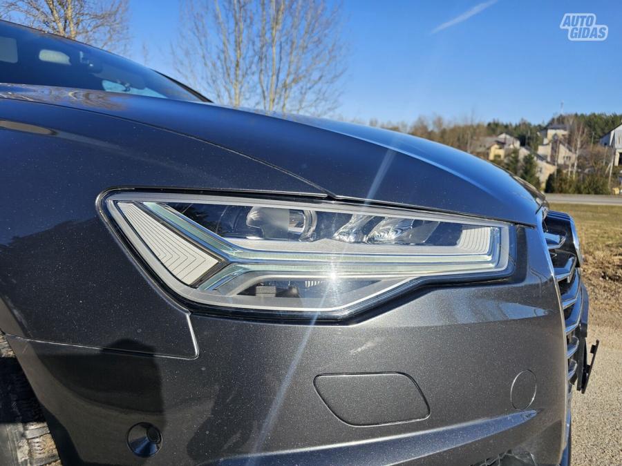 Grey Audi A6 2016 in Alytus, with an engine capacity of 3.00 L and mileage of 243 thousand km for 16500 €, photo 4 on AUTOMOTO.COM.LV