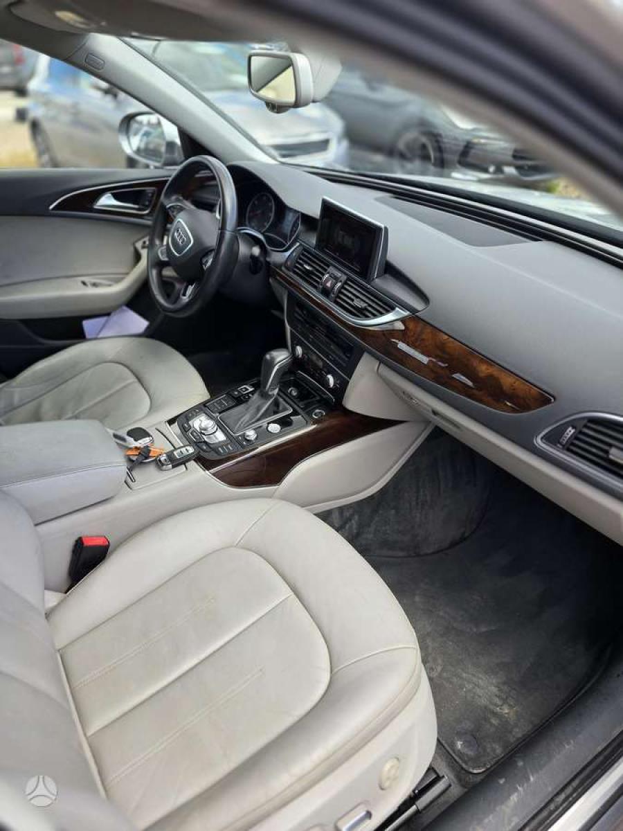 Grey Audi A6 2016 in Taurage, with an engine capacity of 2.97 L and mileage of 283 thousand km for 9500 €, photo 13 on AUTOMOTO.COM.LV