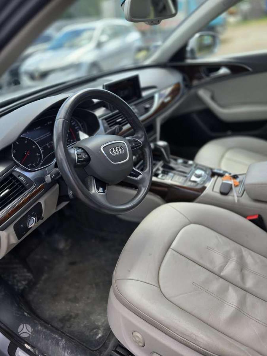 Grey Audi A6 2016 in Taurage, with an engine capacity of 2.97 L and mileage of 283 thousand km for 9500 €, photo 15 on AUTOMOTO.COM.LV