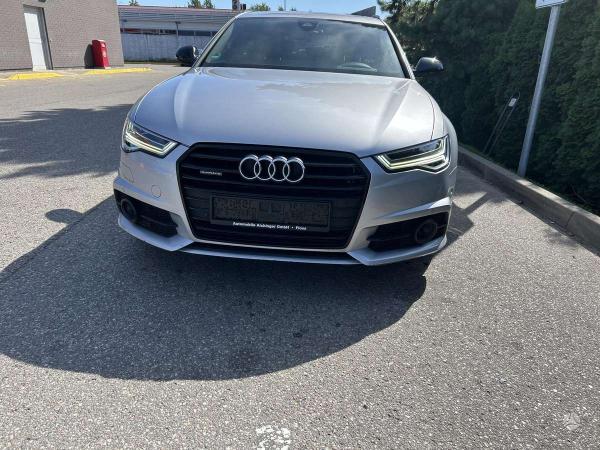 Audi A6 2016 in Utena on AUTOMOTO.COM.LV Grey Audi A6 2016 in Utena, with an engine capacity of 3.00 L and mileage of 221 thousand km for 18200 €, photo 3 on AUTOMOTO.COM.LV